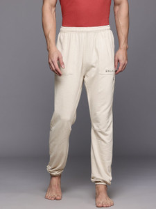 HRX by Hrithik Roshan Solid Men Beige Track Pants - Buy HRX by Hrithik ...