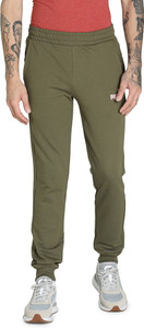PUMA Criss-Cross Logo Pants Solid Men Green Track Pants - Buy PUMA ...
